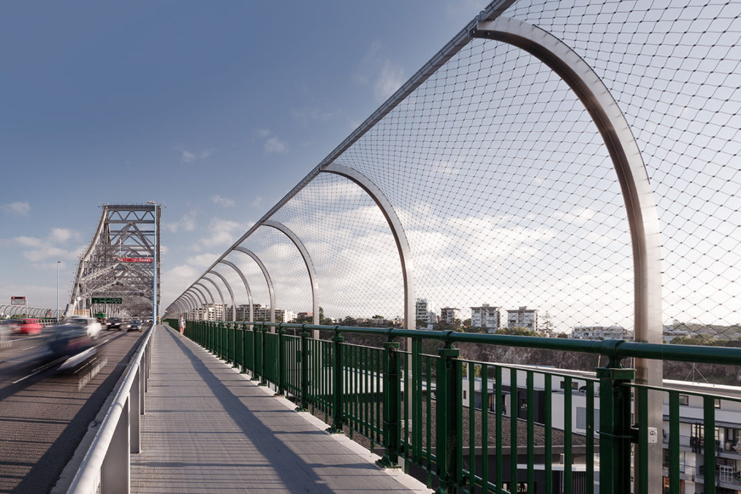 Held together by function and aesthetics: tensile mesh barriers and ...