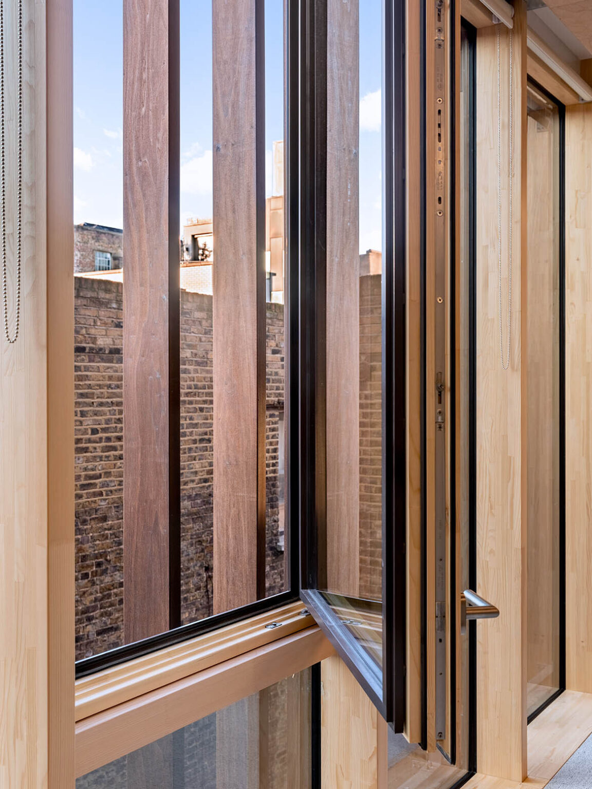 The timber Black & White Building | IndesignLive